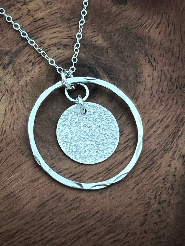 Sterling silver hoop with disk – Artisan Jewelry by Erica Gooding